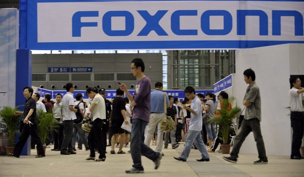 Hon Hai Technology Group (Foxconn) has replaced 60,000 human workers ...