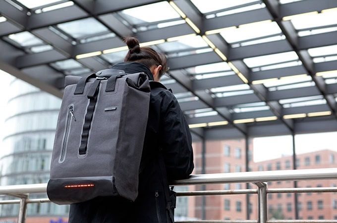 These stylish backpacks feature a 13,400 mAh power bank for charging ...
