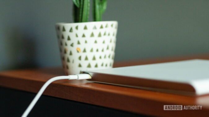 What is fast charging and how does it work in smartphones?