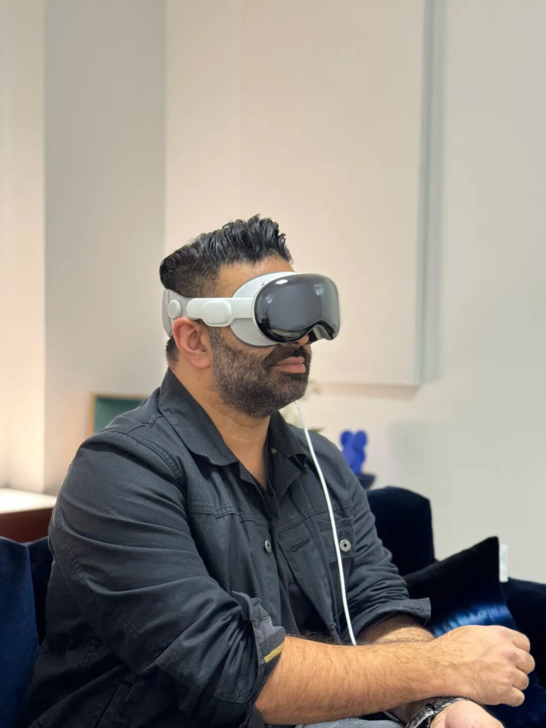 All those photos of people wearing Vision Pro? Apple cropped out a key ...